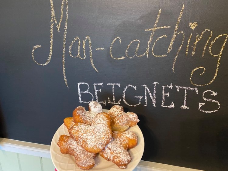 man-catching-beignets | Pirates & Princesses
